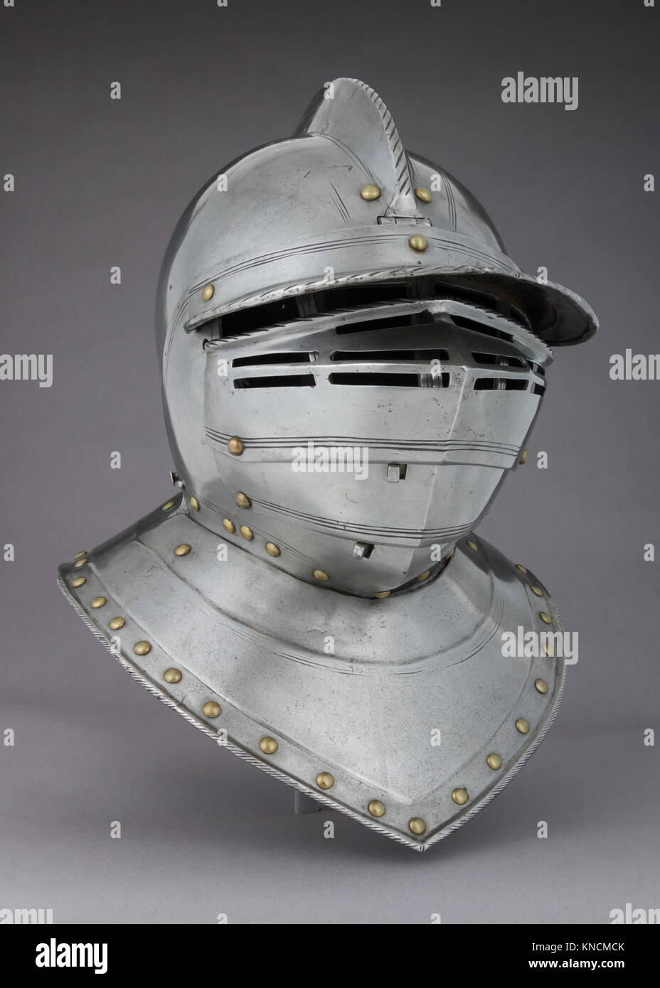 This closed burgonet helmet features a falling buffe, a hinged facial ...