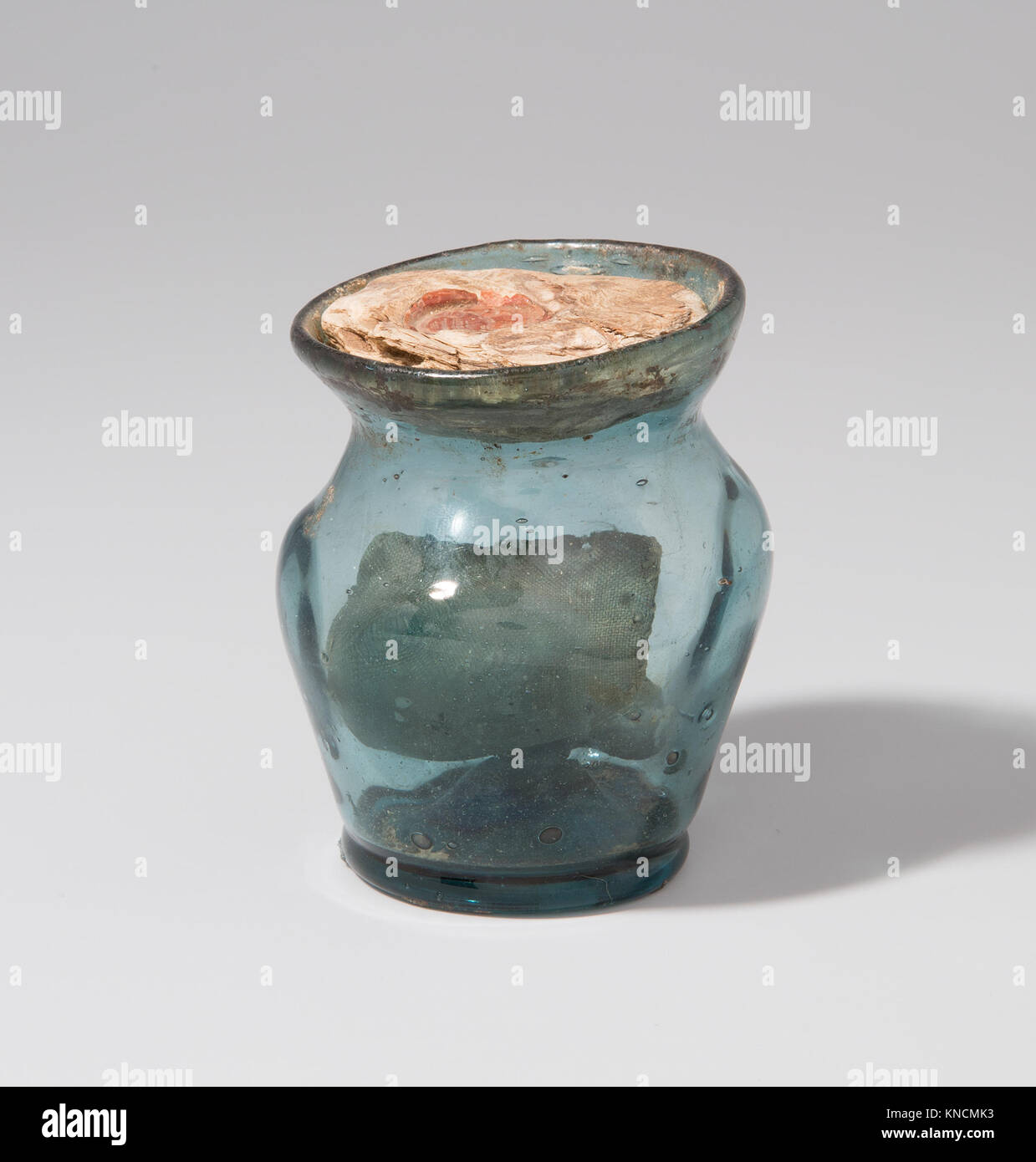 A glass reliquary, part of the MET collection, likely used to house ...