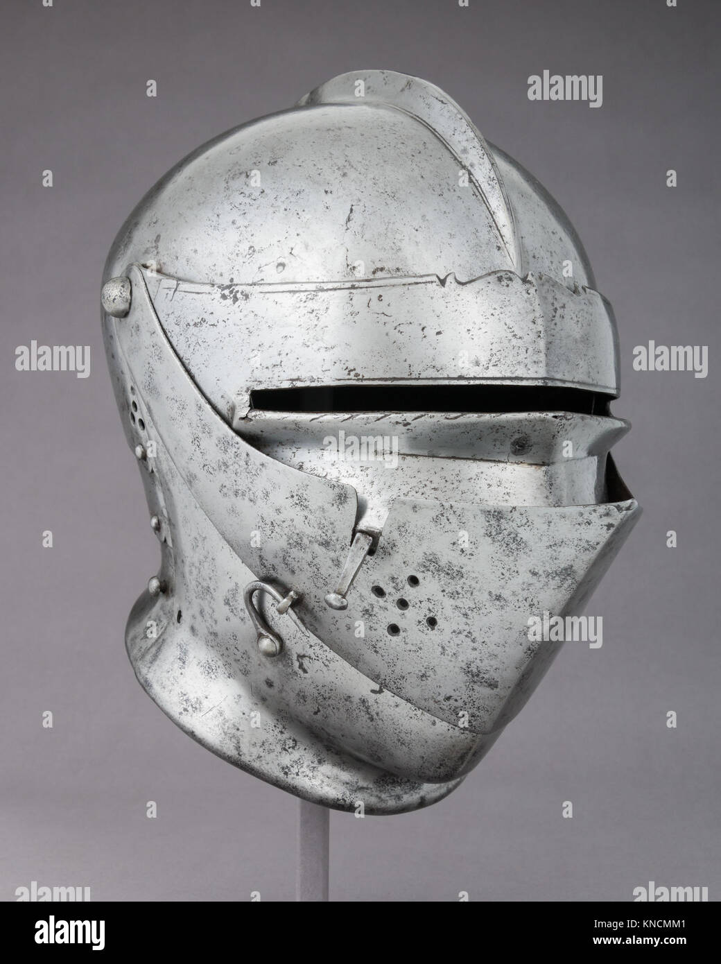 This item is an armet, a type of medieval helmet used for protection in ...