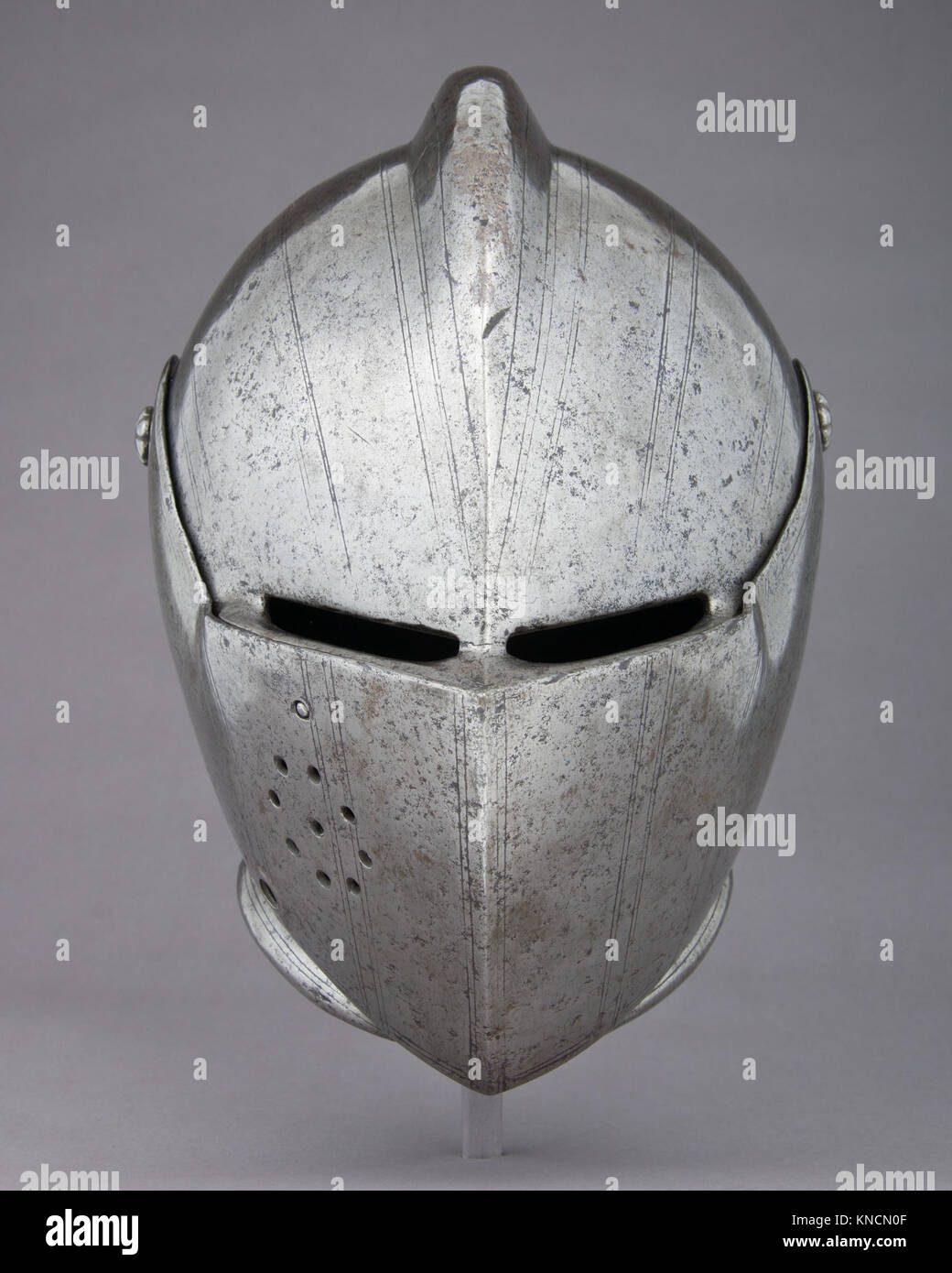This armet helmet from the late Middle Ages is fully enclosed with a ...