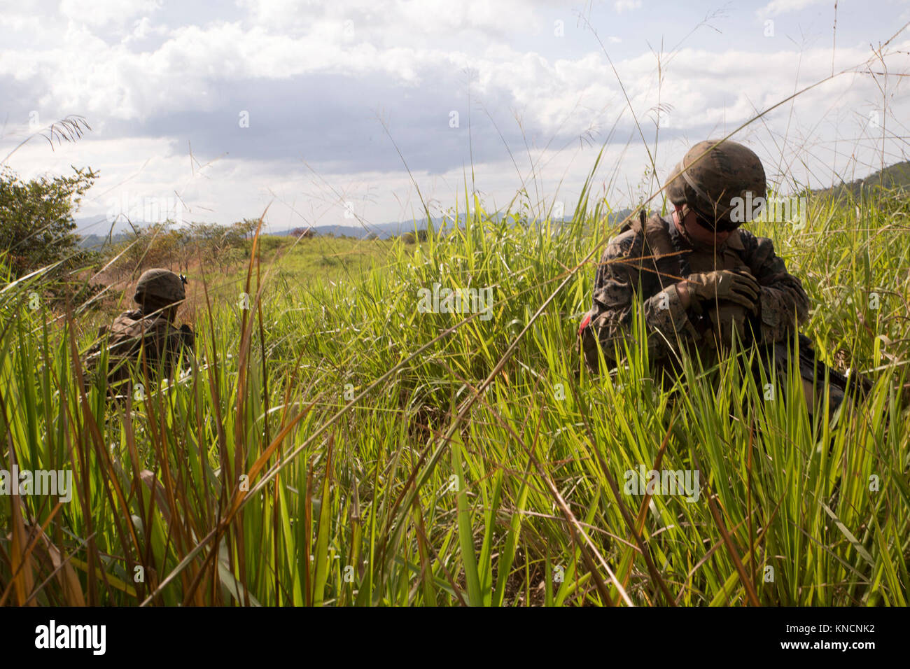 U.S. Marine Cpl. Daniel Mundaca (left) and Sgt. Michael Kivler (right ...