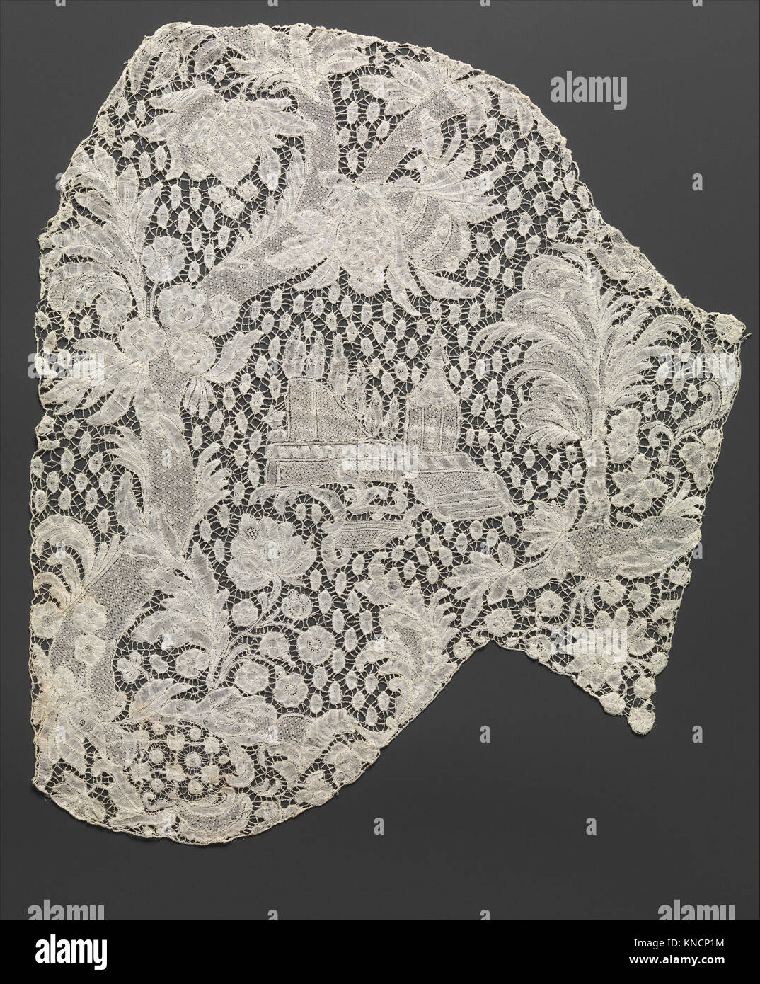 This fragment of bobbin lace represents fine craftsmanship in textile ...