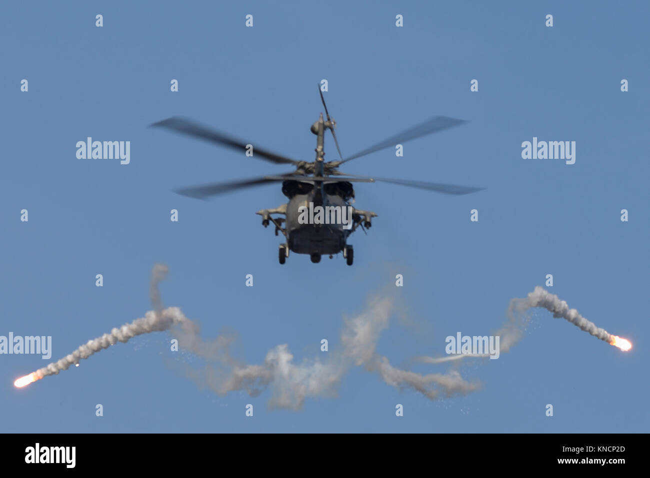 6, launches flares during an aerial change of command ceremony ...