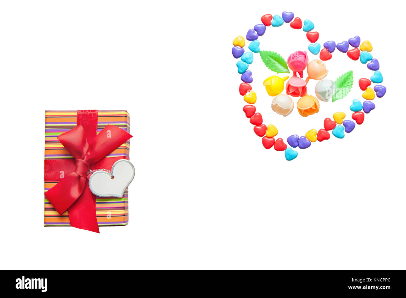 Two hearts of little colorful candy hearts. Caramelized flowers. Gift ...