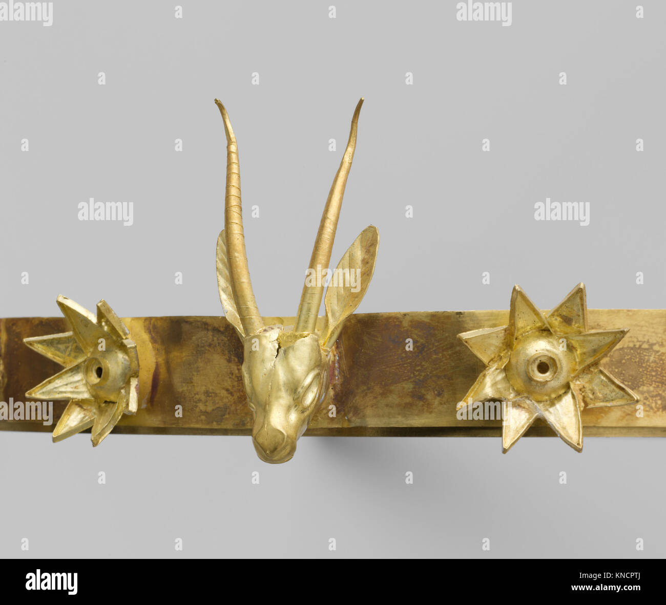 This ancient headband depicts gazelle heads and a stag surrounded by ...