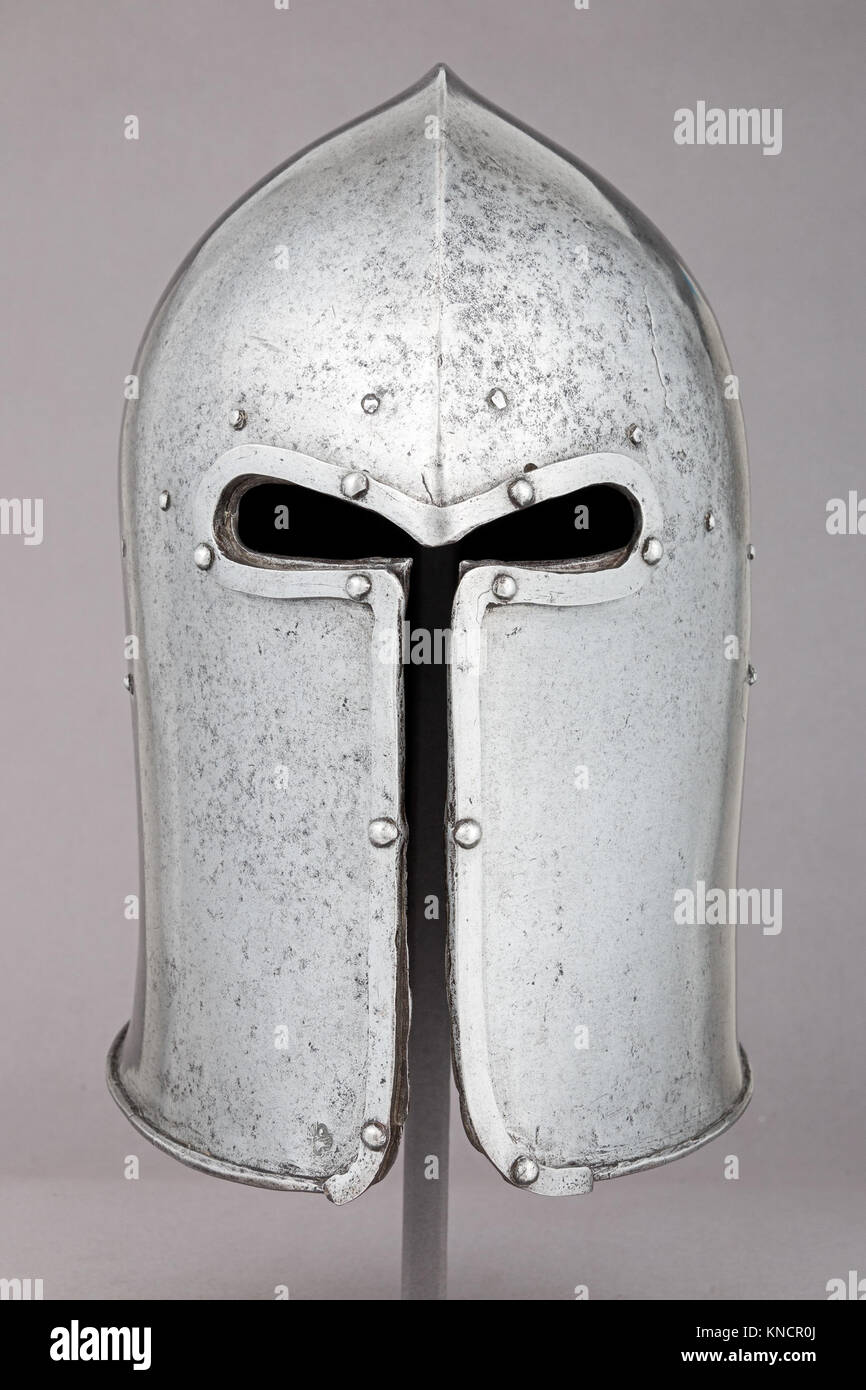 This Italian medieval barbute helmet, used in combat, exemplifies armor ...