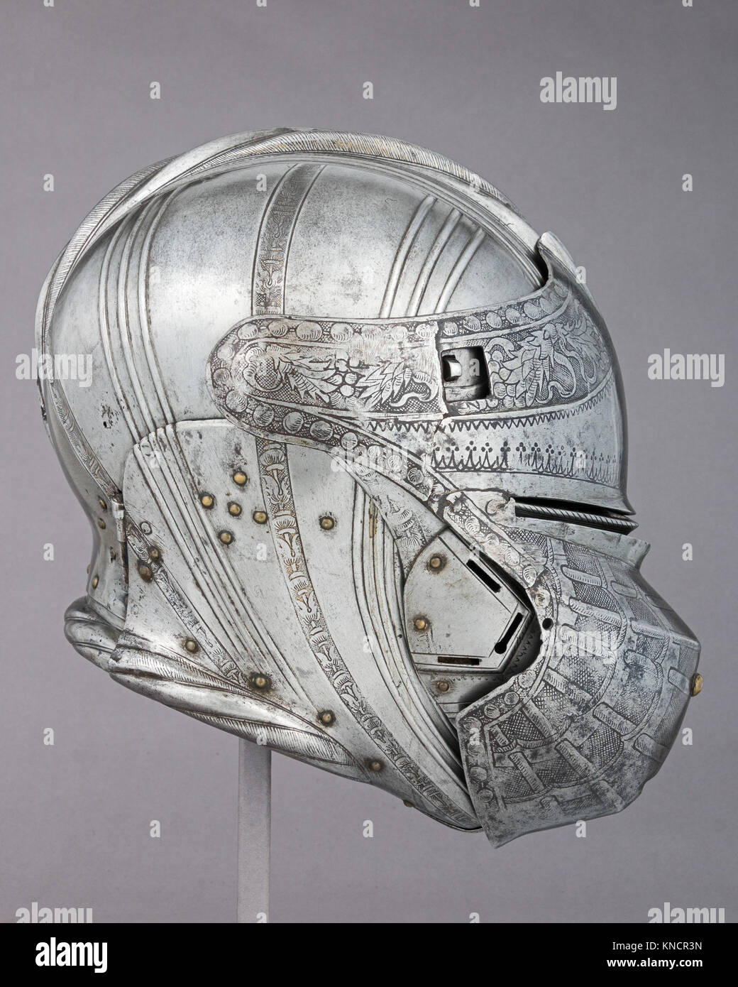 This closed armet helmet, used in jousting tournaments, demonstrates ...