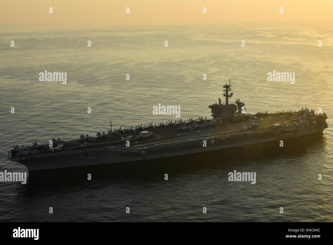 The aircraft carrier USS Theodore Roosevelt (CVN 71) transits the Arabian Gulf. Theodore ...
