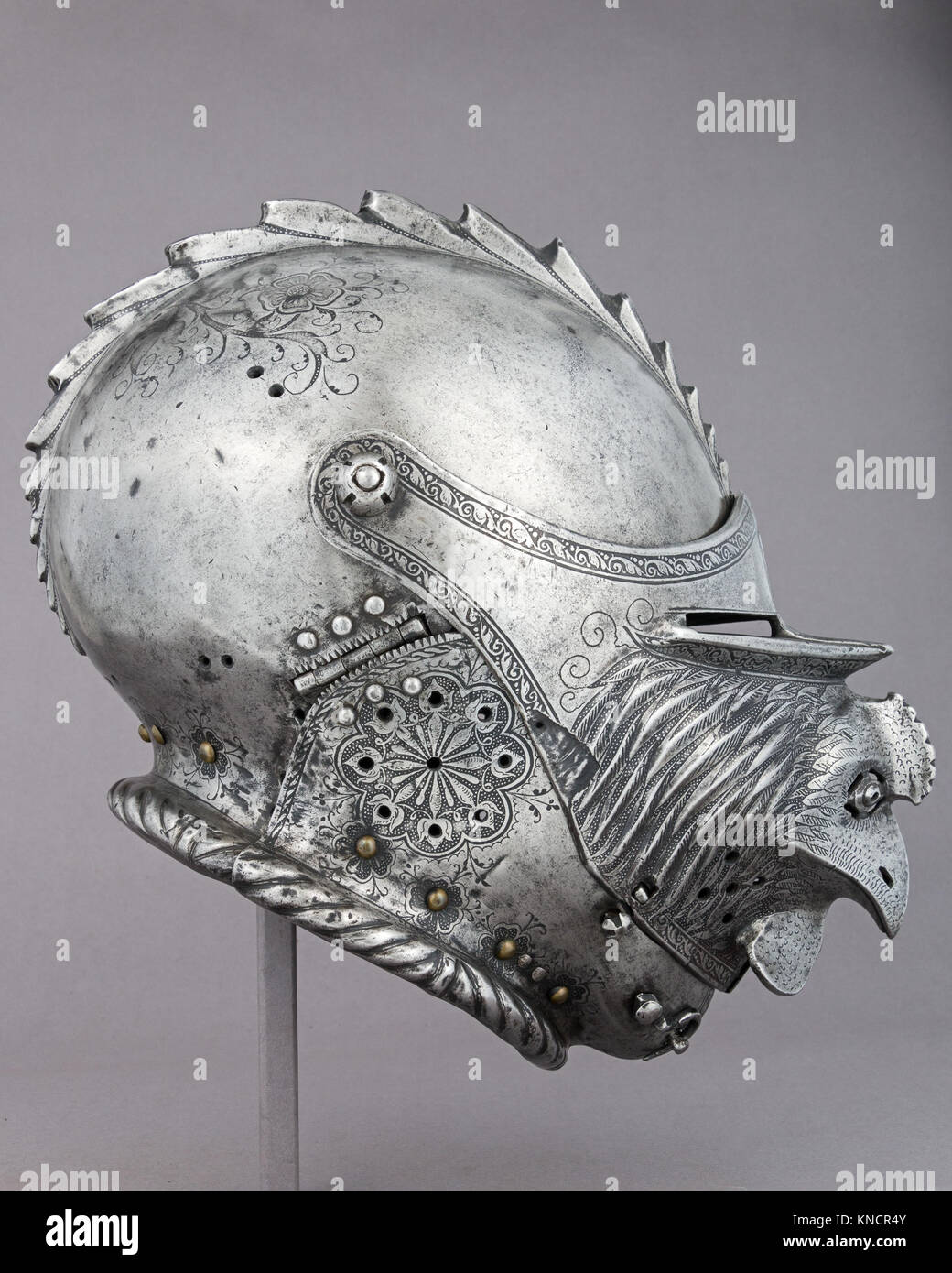 This armet, a type of helmet with a mask visor in the shape of a ...