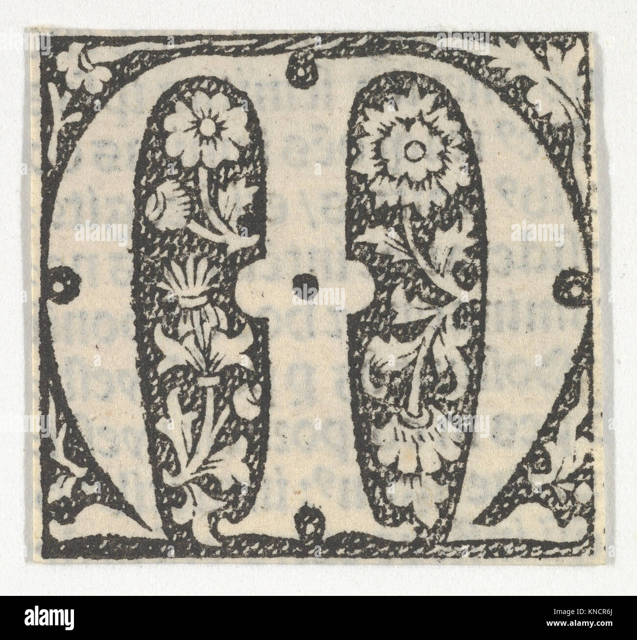 This object displays a decorated Roman alphabet, showcasing the letters ...