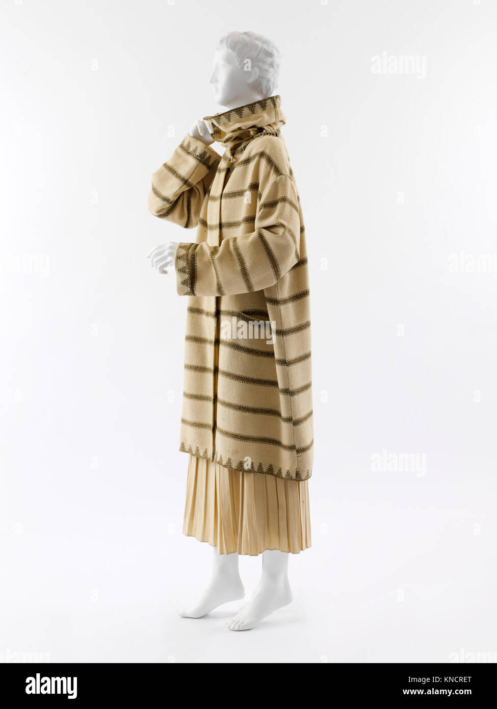 This coat, designed by the renowned French fashion designer Paul Poiret ...