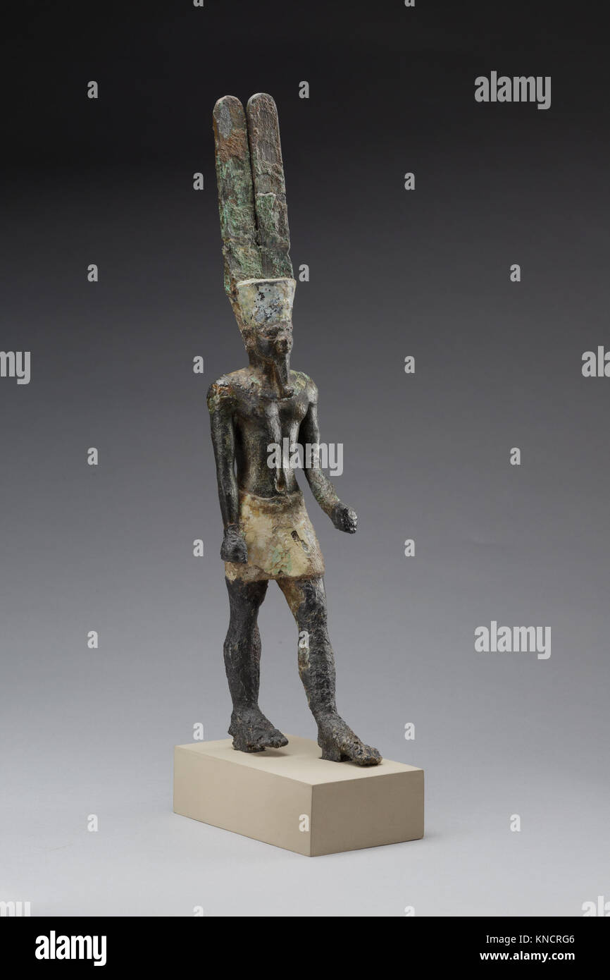 A statue of the Egyptian god Amun, exemplifying the artistic and ...