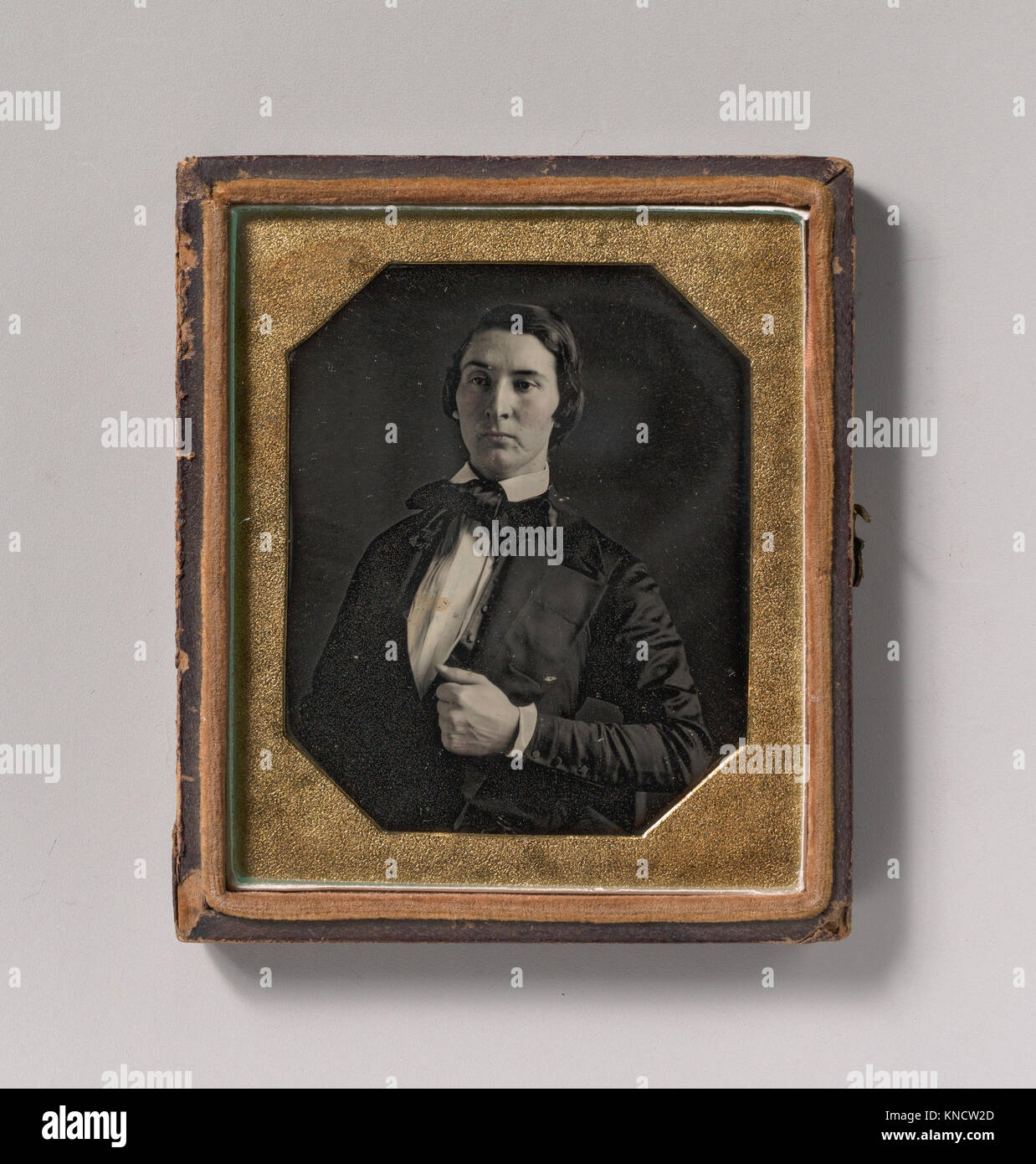 This illustration depicts a young man holding a jacket lapel, showing ...