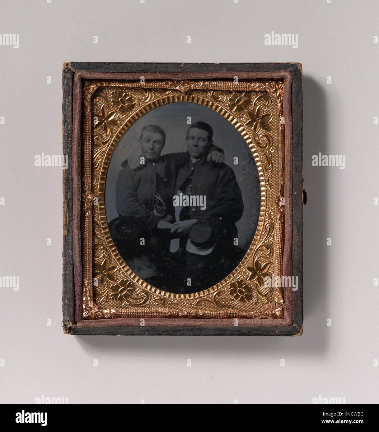 Two Union soldiers during the Civil War embrace with arms around each ...