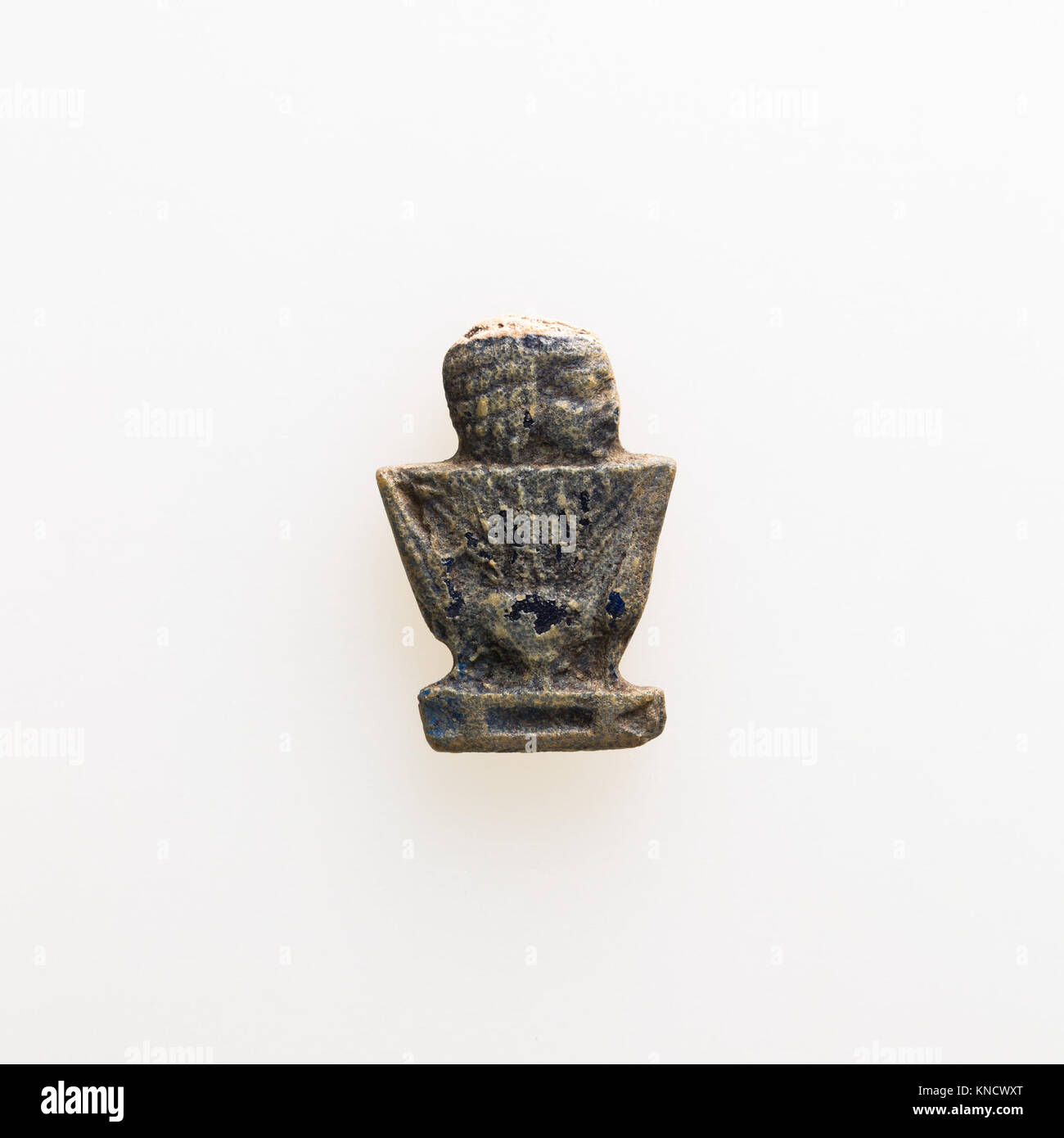 This ancient amulet features a human head emerging from a lotus ...