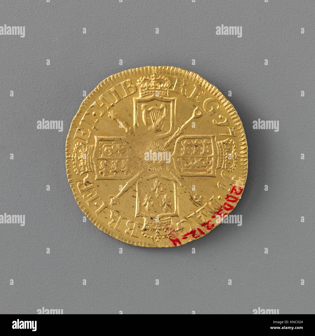 A half guinea coin from the reign of Queen Anne, displayed in The ...