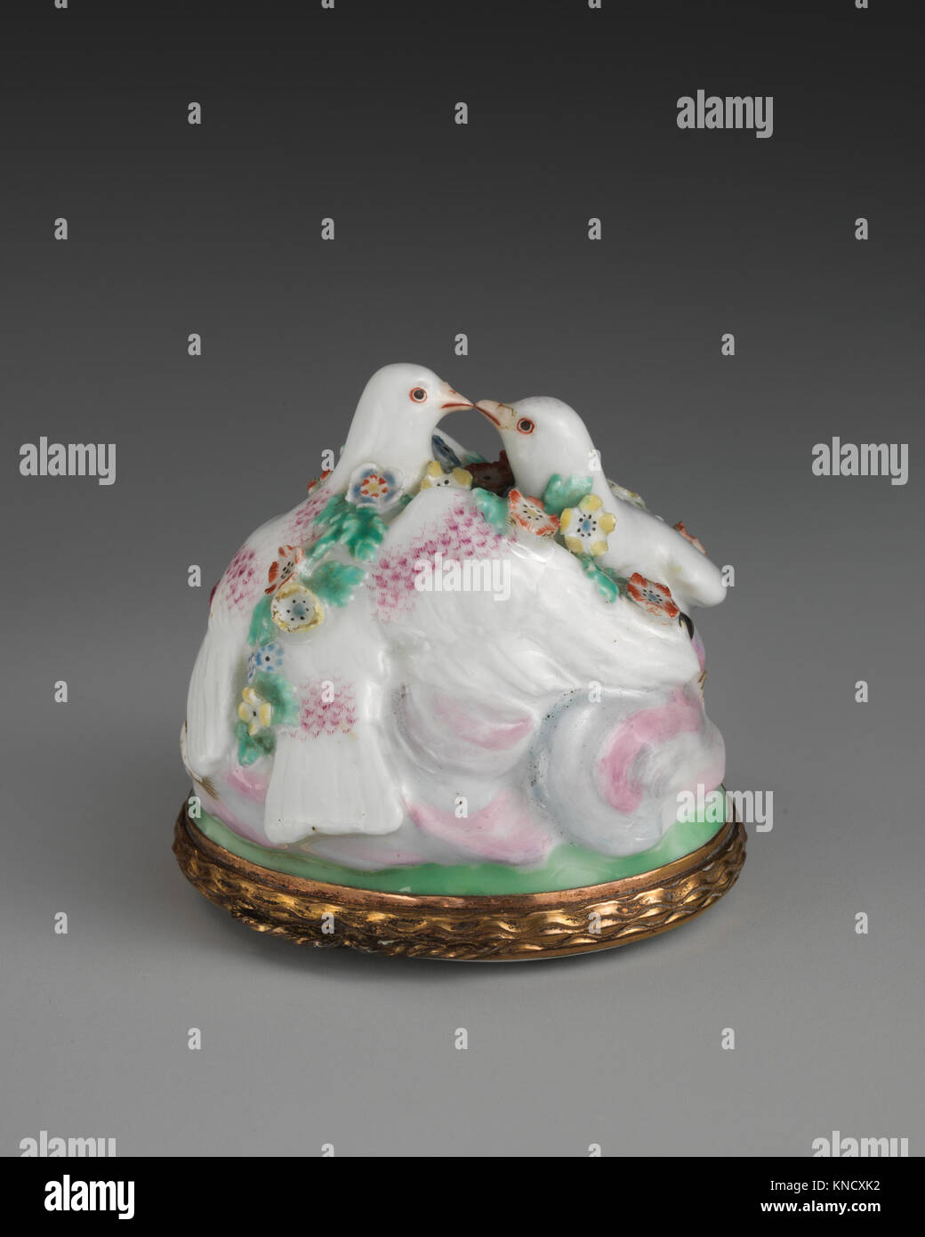 An artwork titled 'Billing Doves,' depicting two doves engaged in a ...