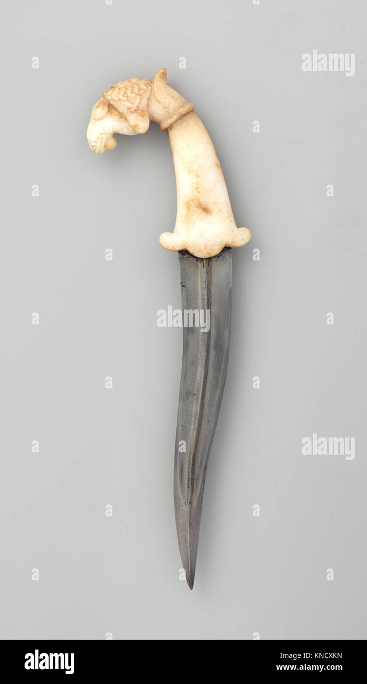 This khanjar dagger, with a curved blade, is a traditional weapon from ...