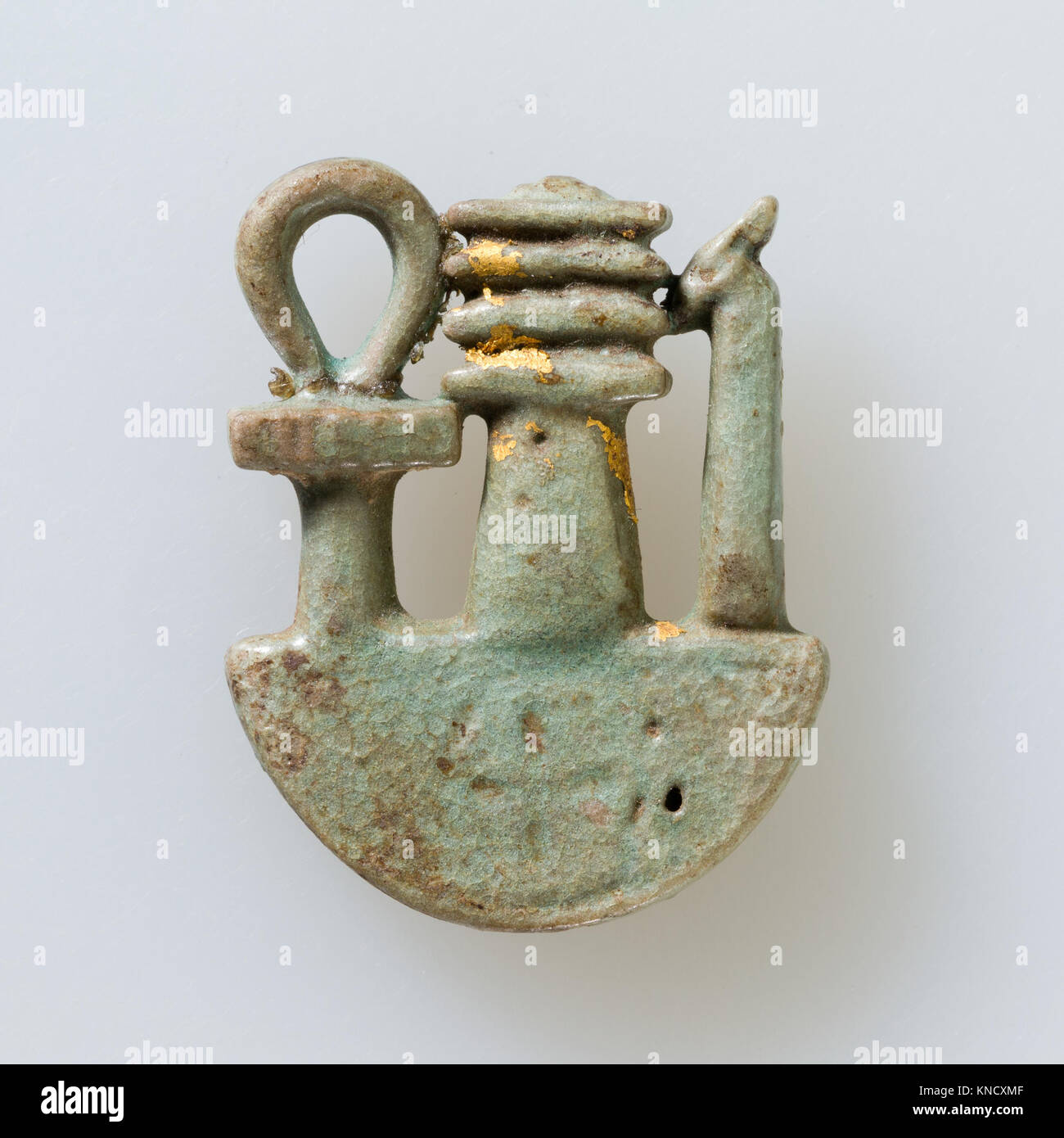 This artifact, featuring the ancient Egyptian symbols of the ankh and ...