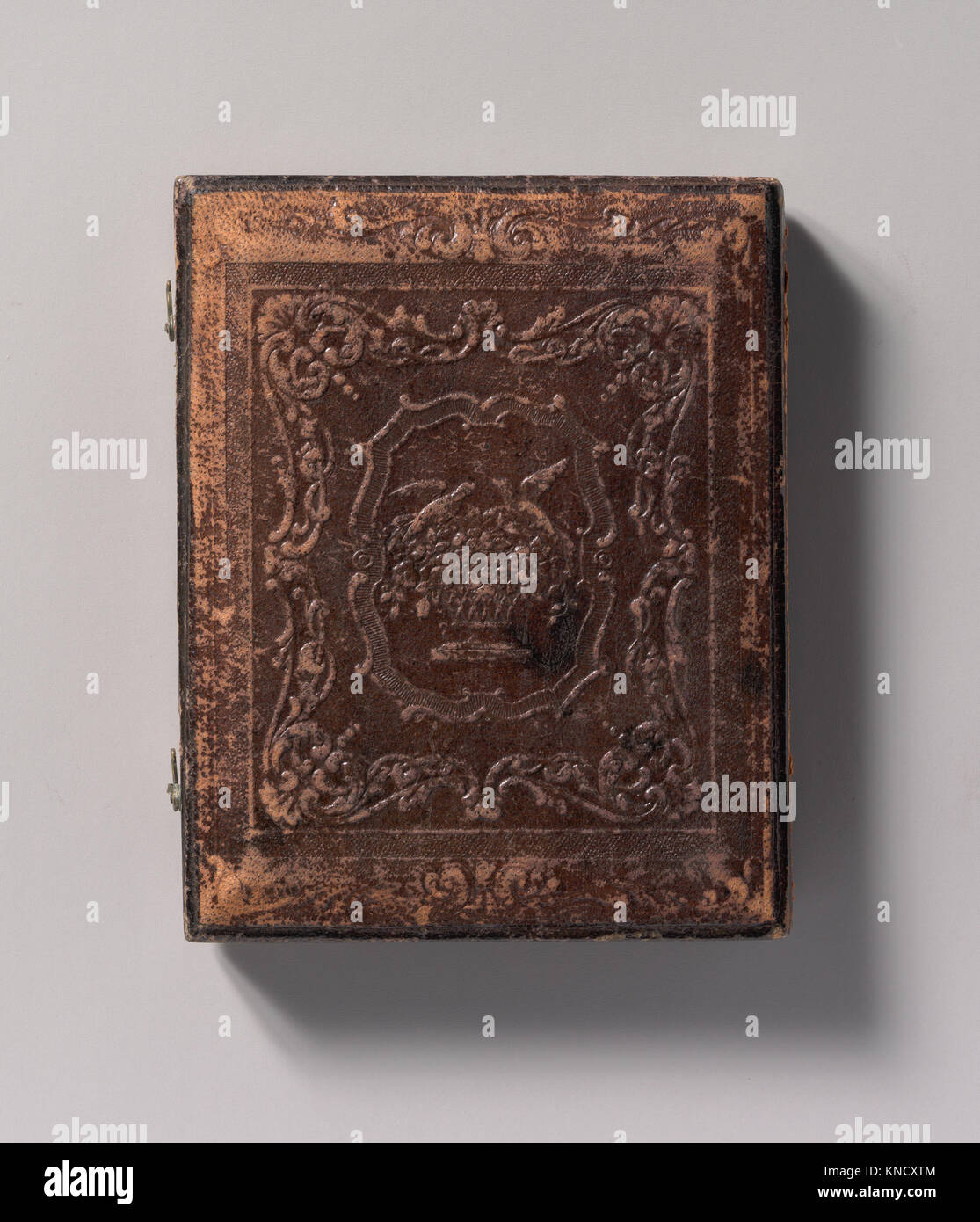 This portrait, depicting a seated elderly man with crossed arms ...