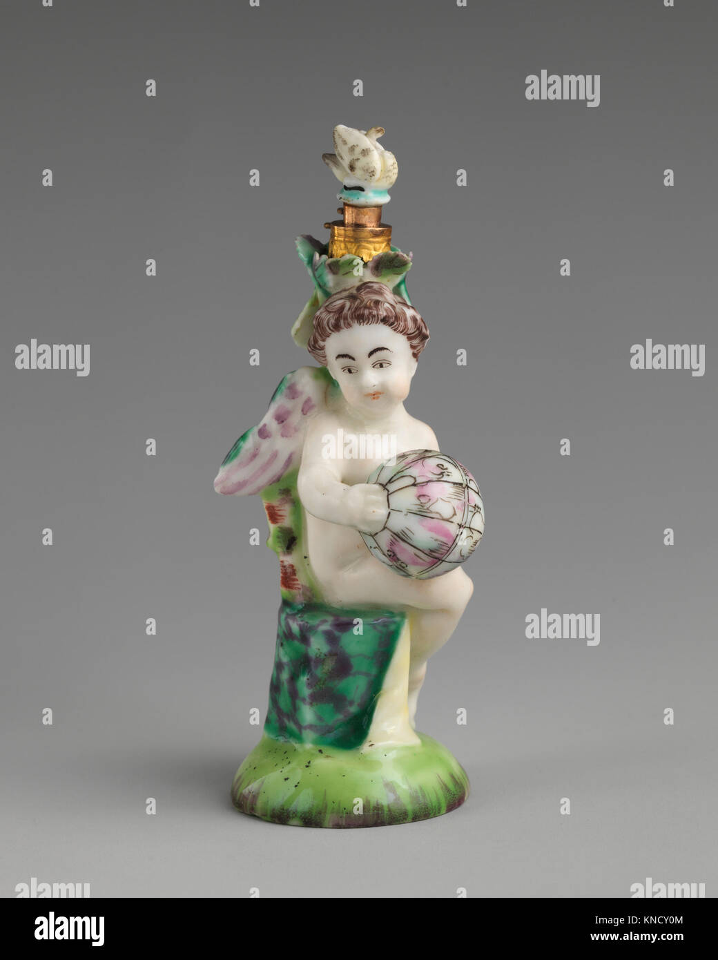 Cupid sculpture holding a globe, representing the Roman god of love and ...