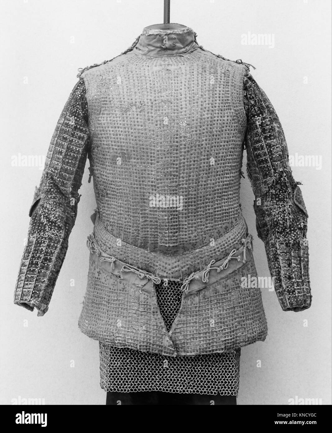 This brigandine is medieval body armor with interlocking metal plates ...