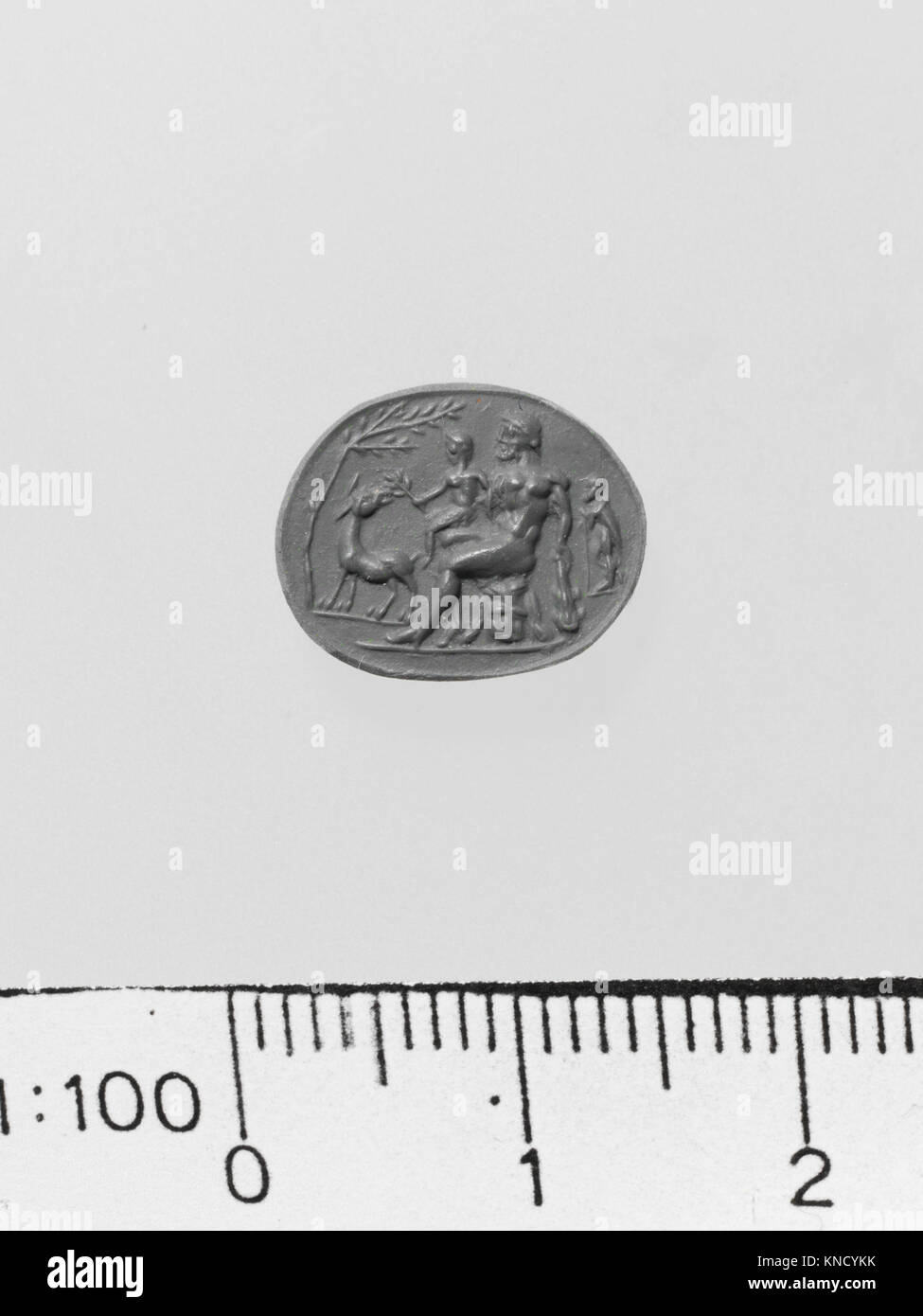 This carnelian ring stone displays detailed engravings, reflecting ...