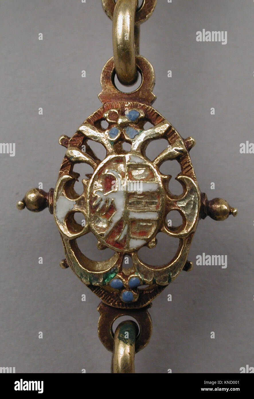 This heraldic chain features a pendant badge, used to symbolize family ...