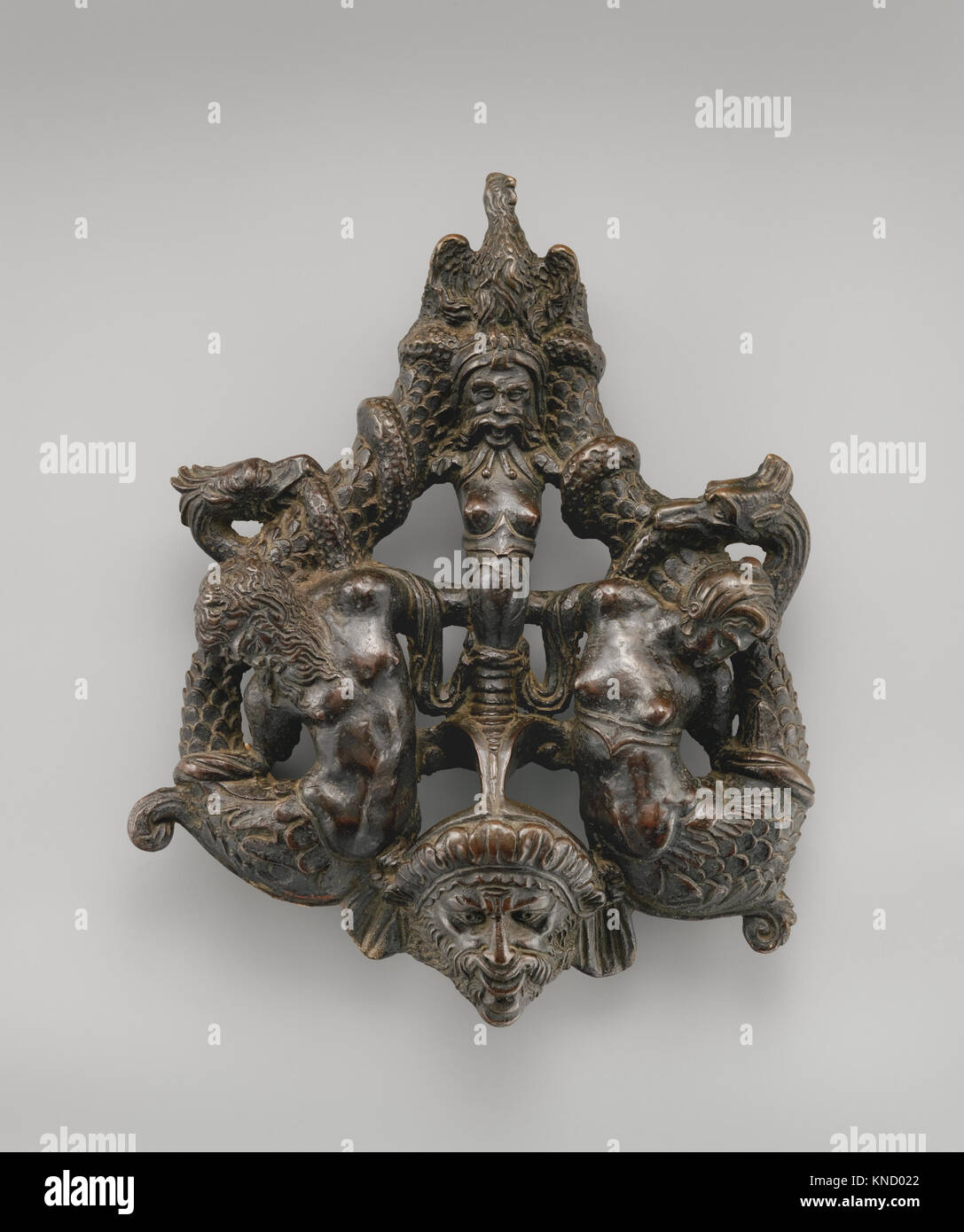 This door knocker is a metal, decorative, and functional hardware piece ...