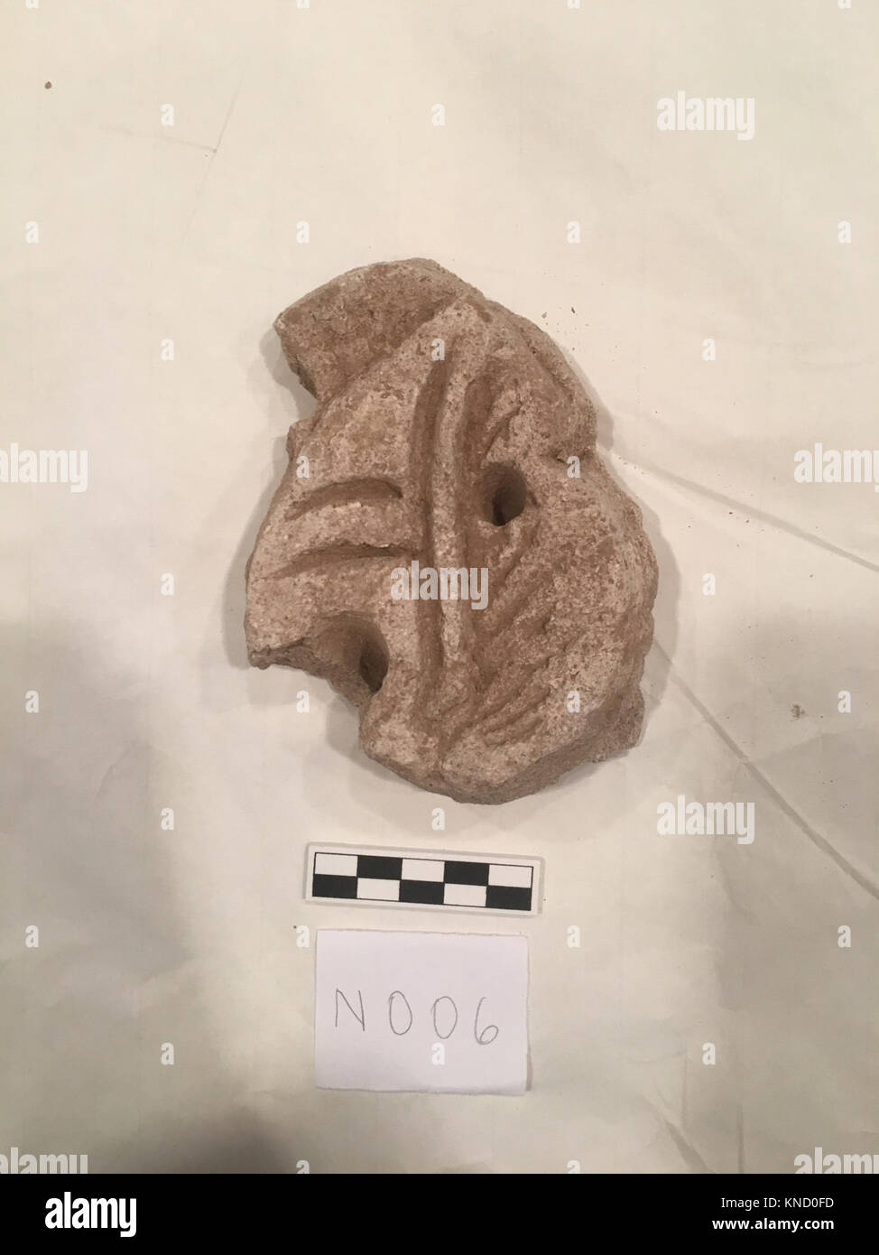 This carved stucco fragment, dating from the 8th to 12th century ...