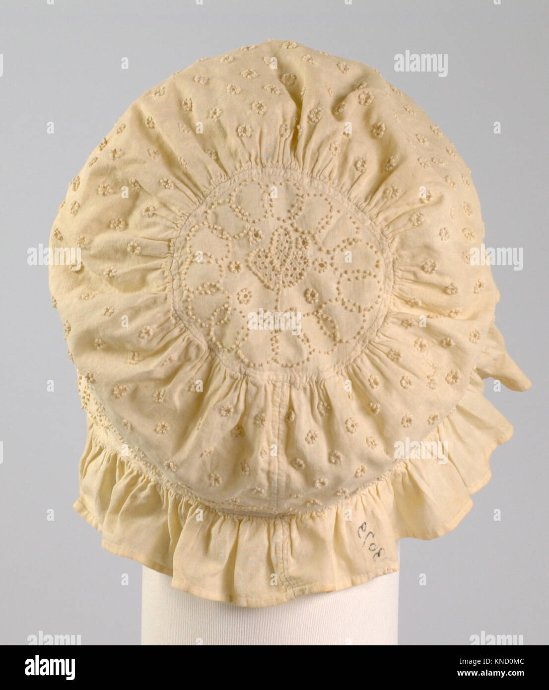 This cap is a historical headpiece, showcasing the design and materials ...