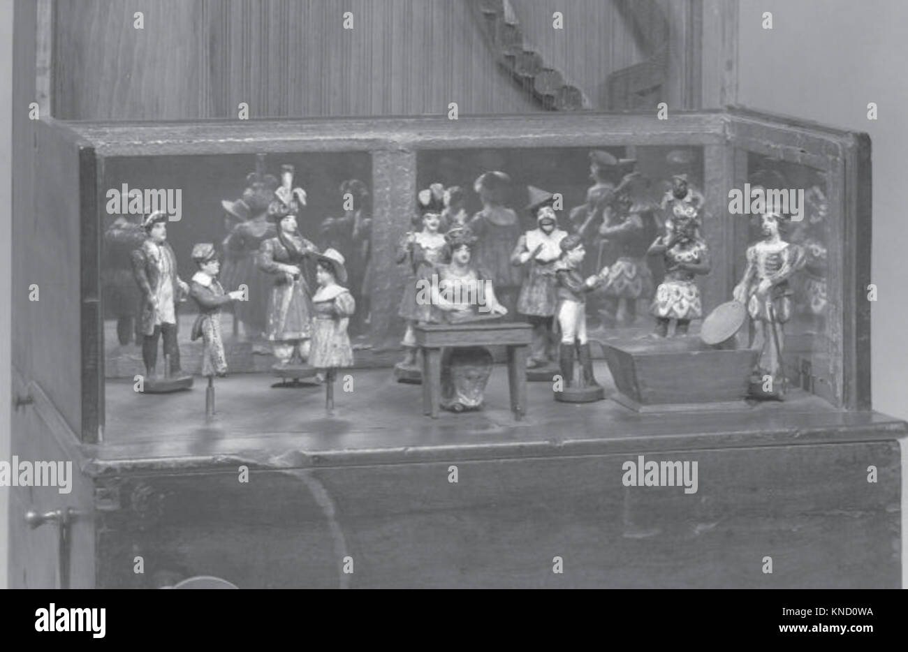 A barrel piano, an automatic musical instrument that plays pre ...