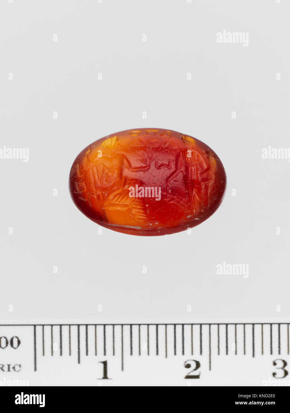 A carnelian ring stone, valued for its rich reddish-brown color, used ...