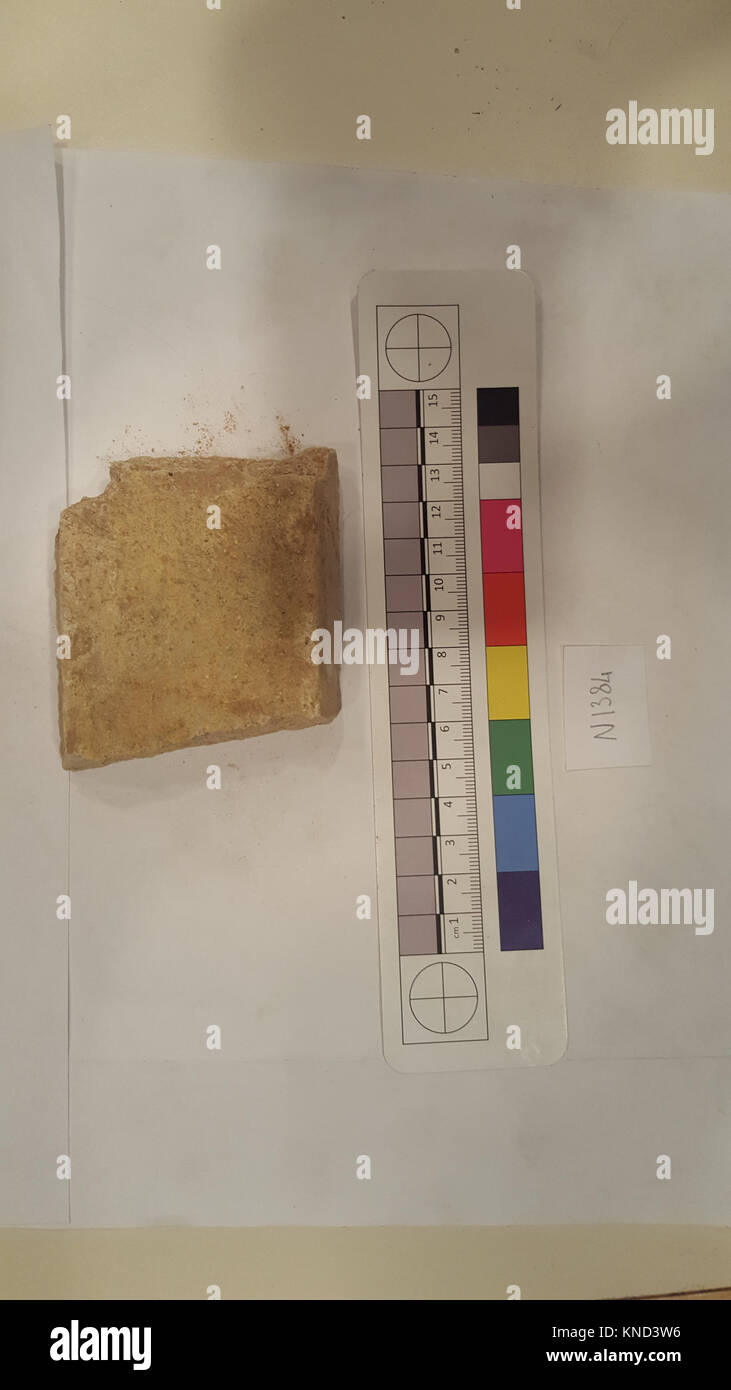 A fragment of a historical object, preserved for study, providing ...