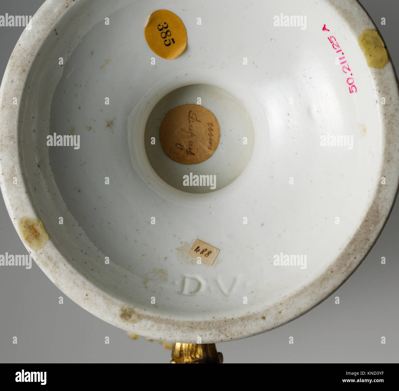 This fountain with cover and spigot is a functional water feature ...