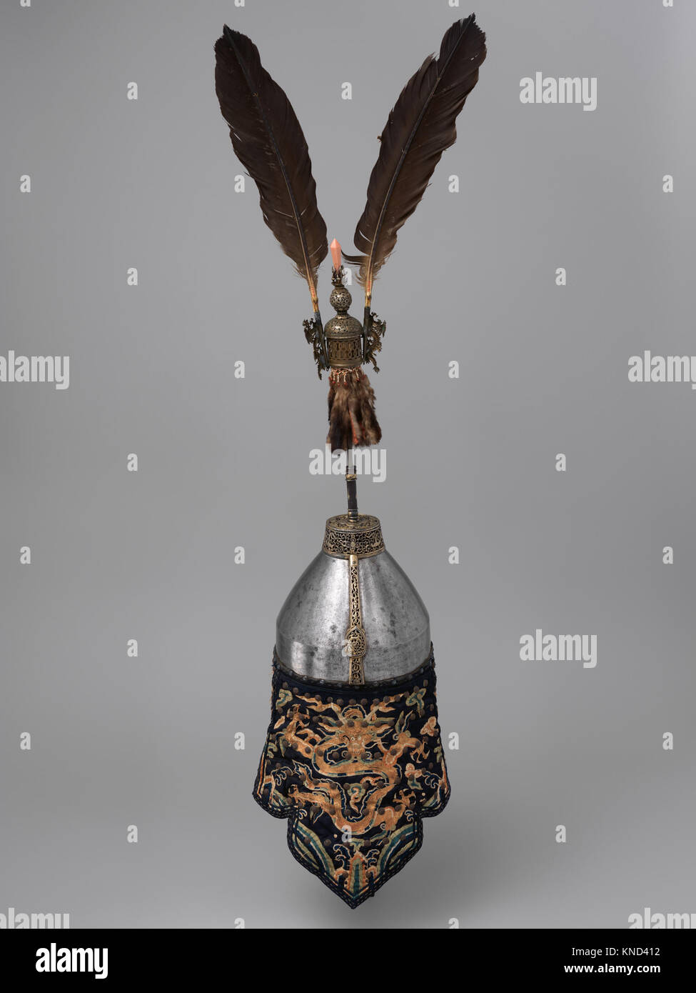 This helmet, featuring a feather crest, is an example of ornate ...
