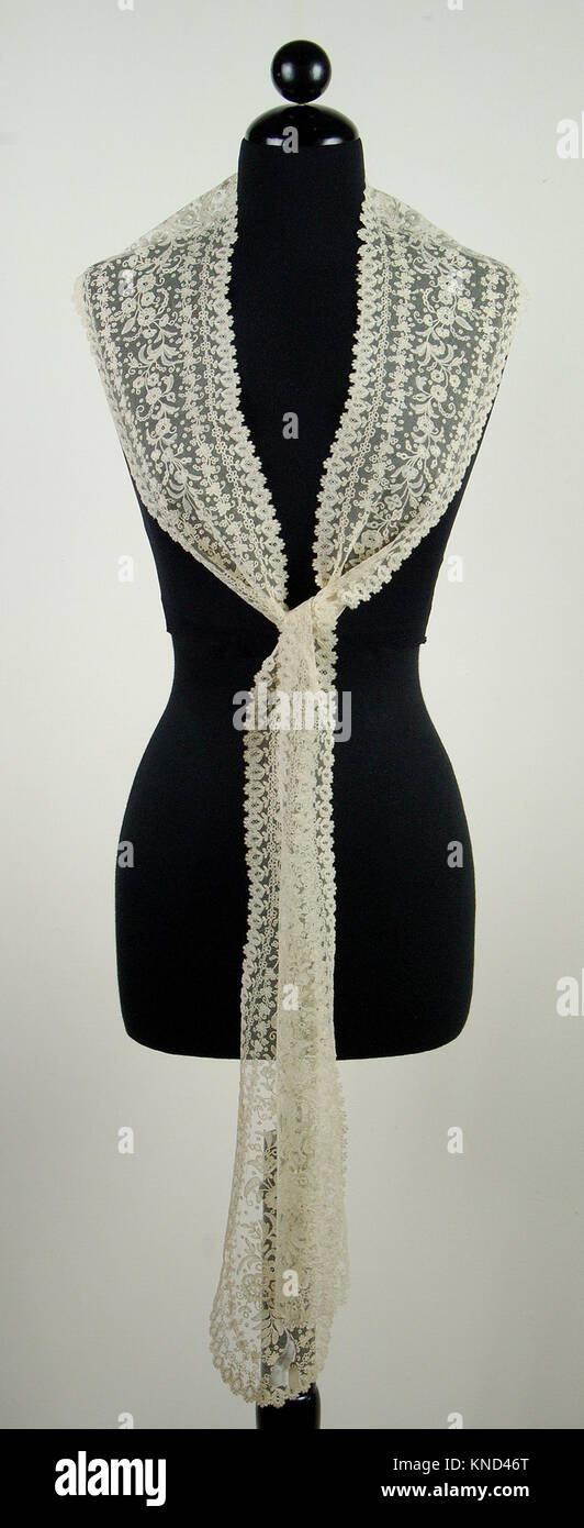 This fichu is a delicate accessory worn around the neck or shoulders ...