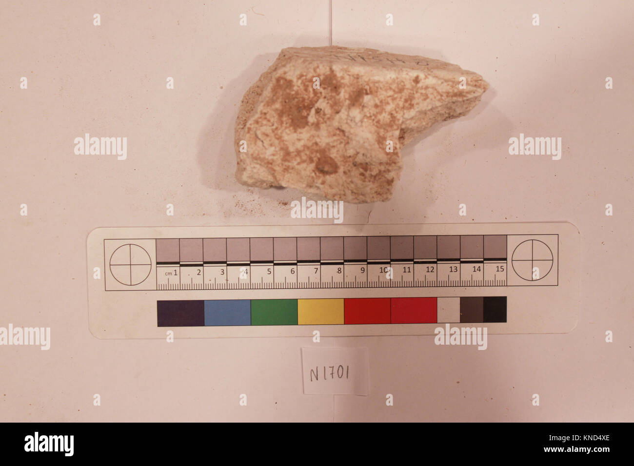 A fragment from an ancient artifact, possibly from a larger object or ...