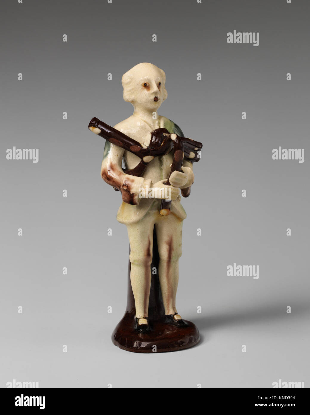 This artwork depicts a bagpiper, an iconic figure in traditional music ...