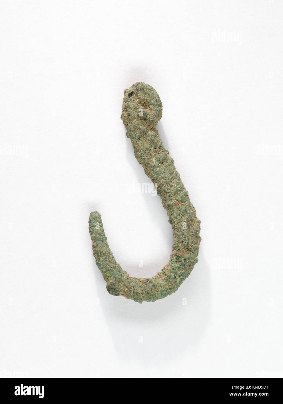This fish hook, an ancient tool used for fishing, is part of The ...