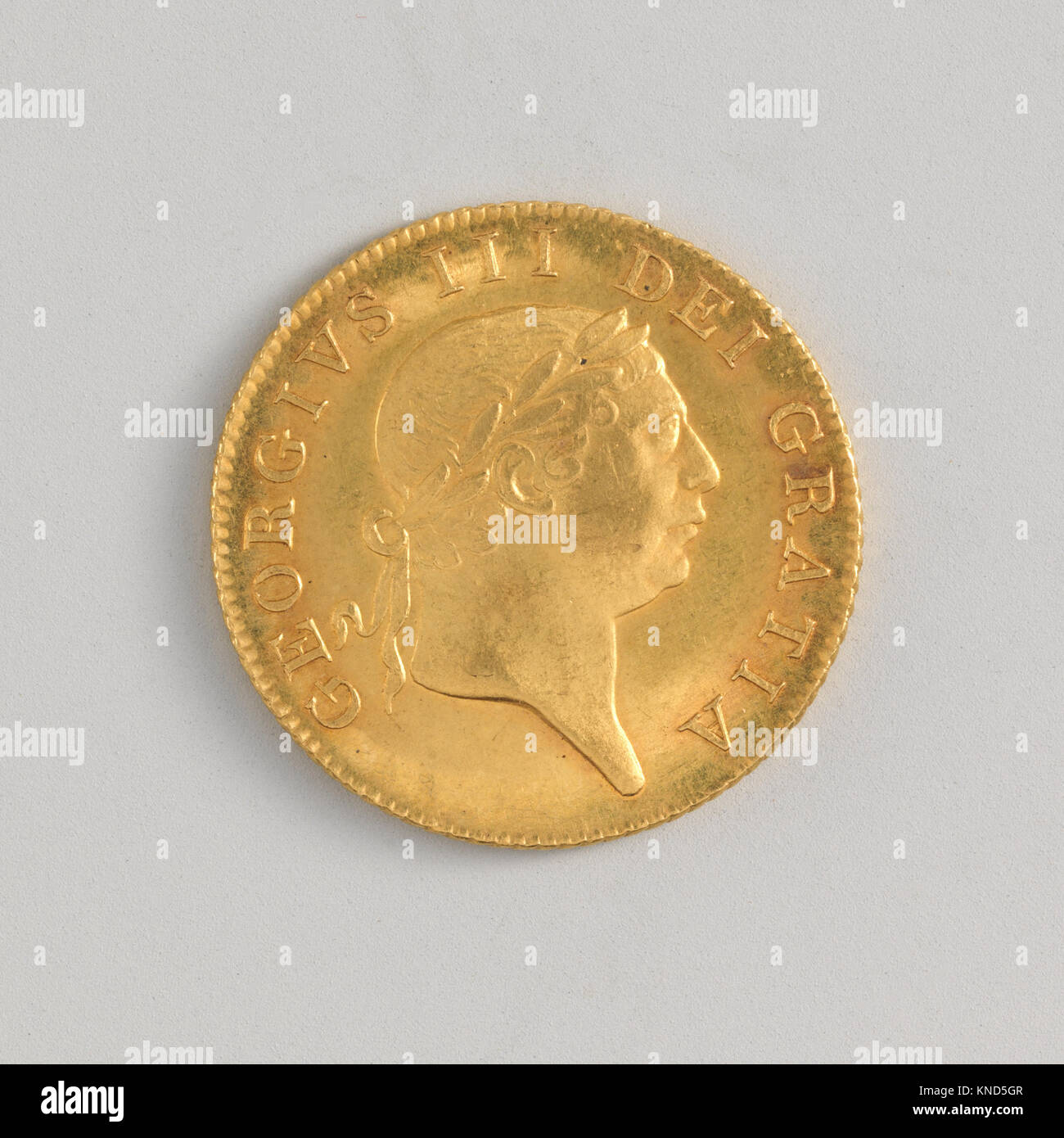 This George III guinea coin, a military type, represents the currency ...