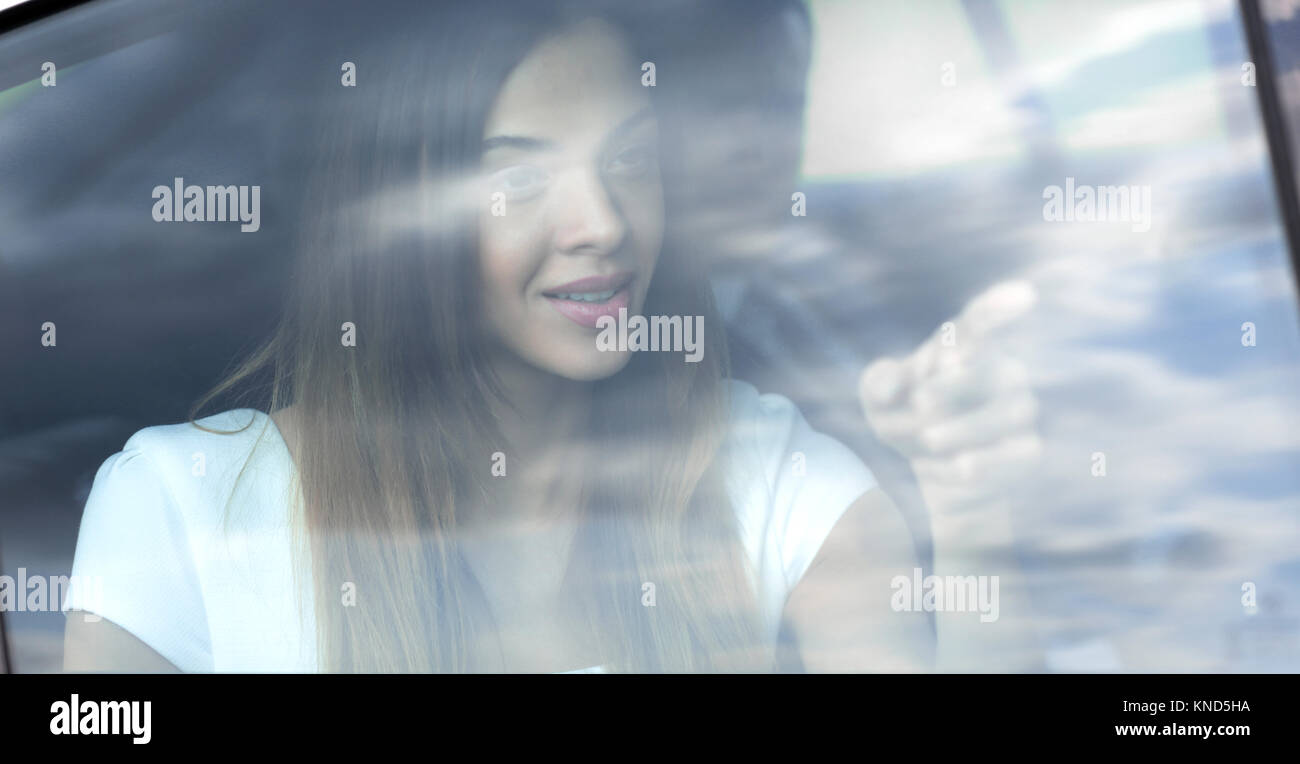 sad portrait of a woman outside a car window Stock Photo - Alamy