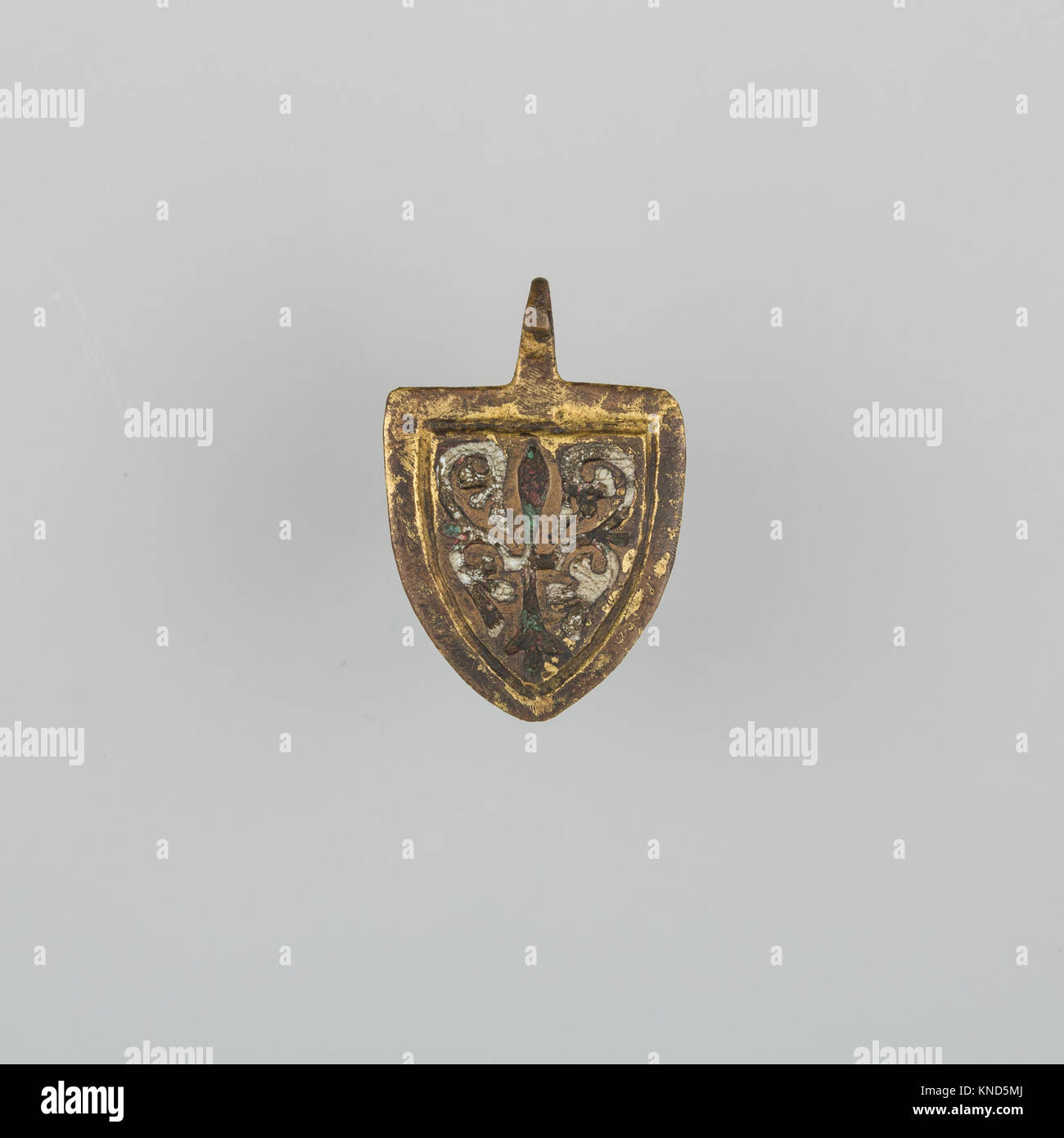 This late 14th-century Spanish badge, crafted from copper, gold, and ...