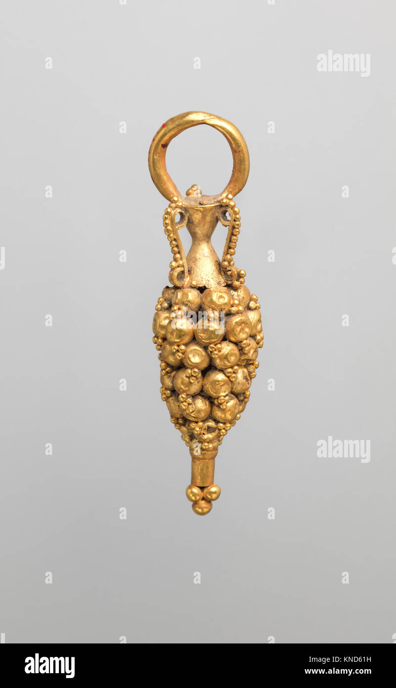 This Parthian earring, dating from the 1st-2nd century A.D., is a ...