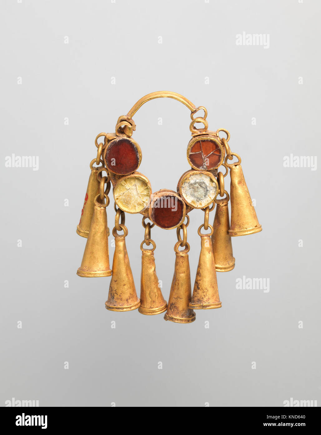 These Parthian gold earrings from the 1st–2nd century A.D., set with ...