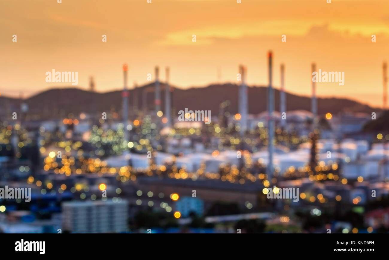 Oil refinery and oil thank in sunset background , petrochemical plant ...