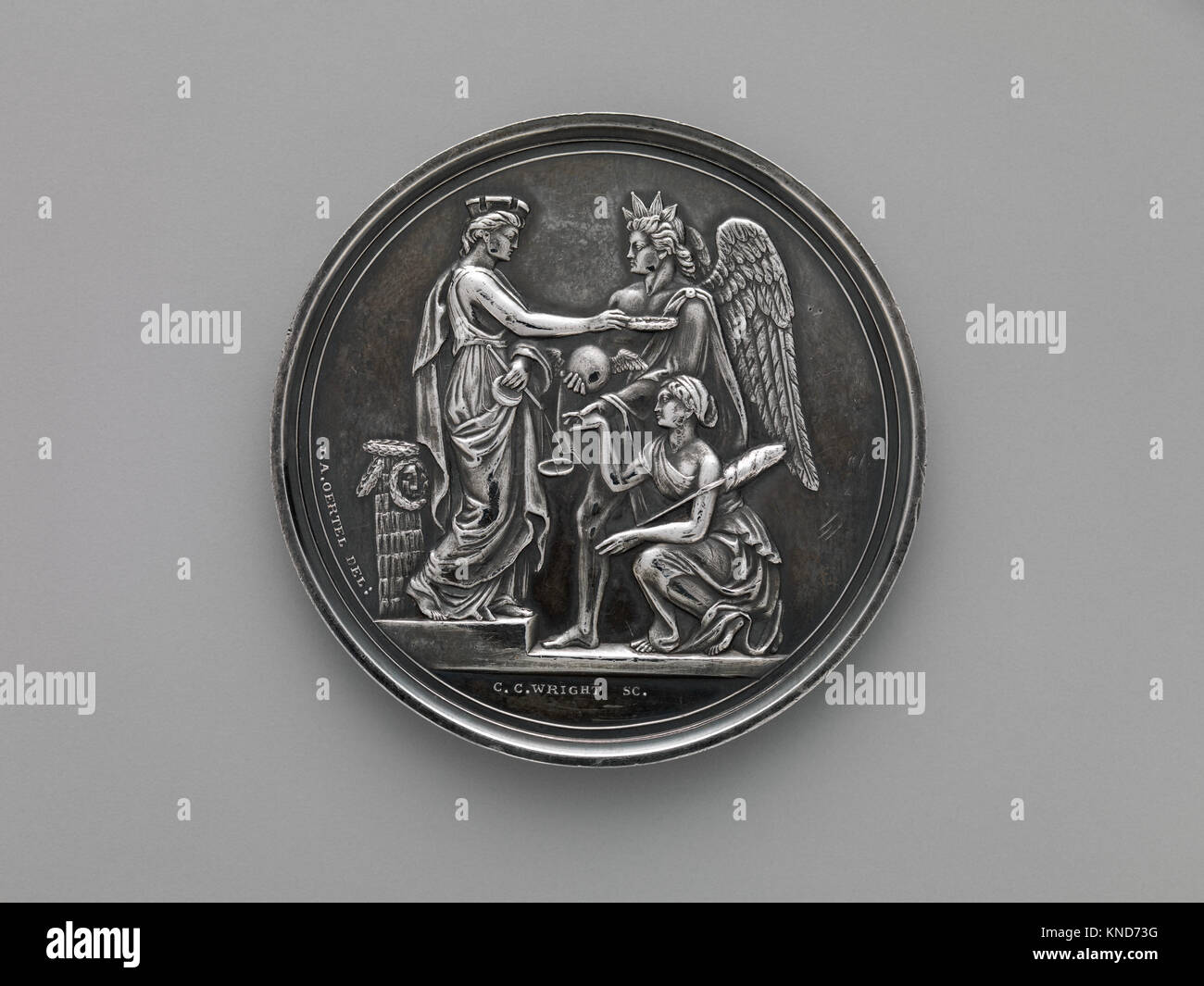 A silver medallion commemorates the 1853 opening of the First ...