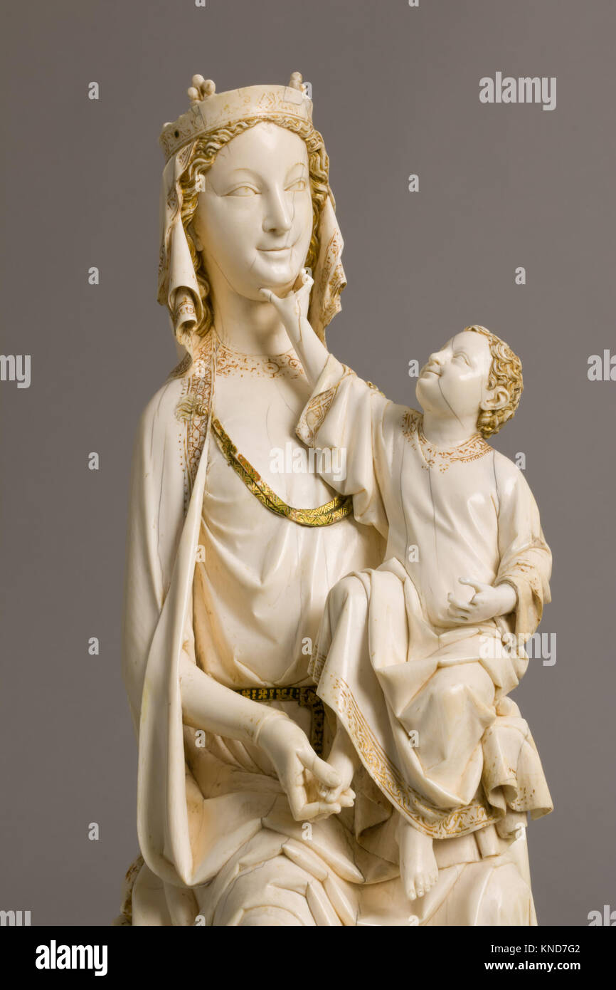 This 13th-century French ivory sculpture depicts the Virgin Mary ...