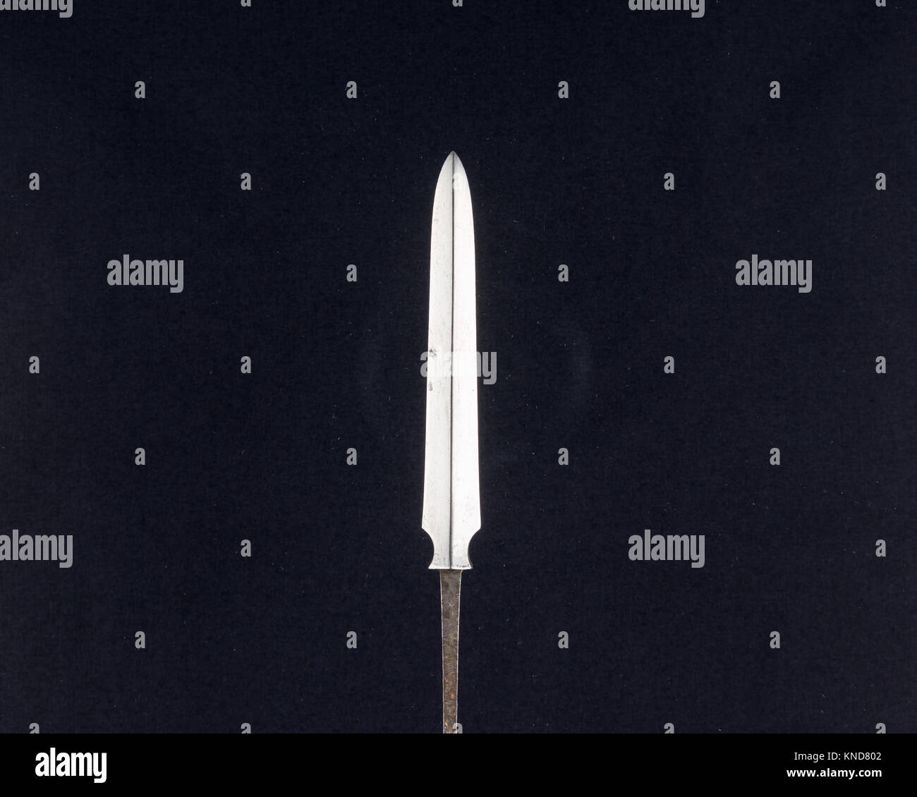 This 18th-century Japanese arrowhead, made from steel, reflects the ...