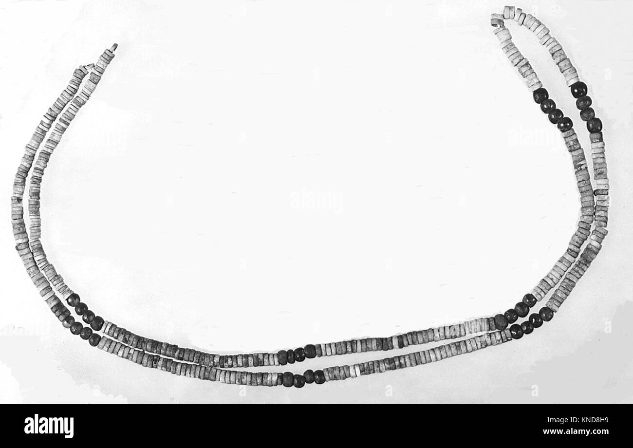 The bead girdle, composed of small beads, demonstrates intricate ...